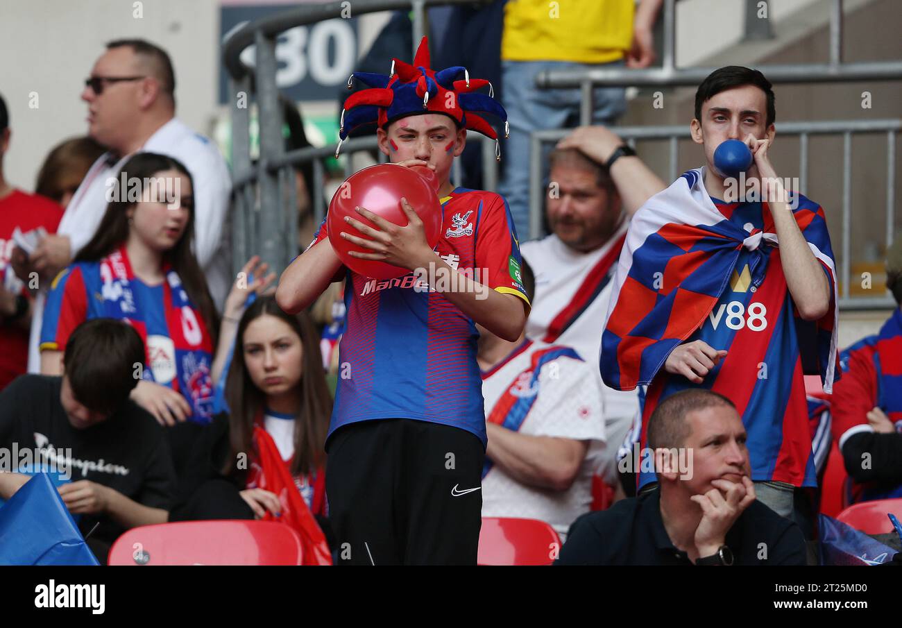 Crystal Palace fans blowing up balloons ahead of kick off against ...