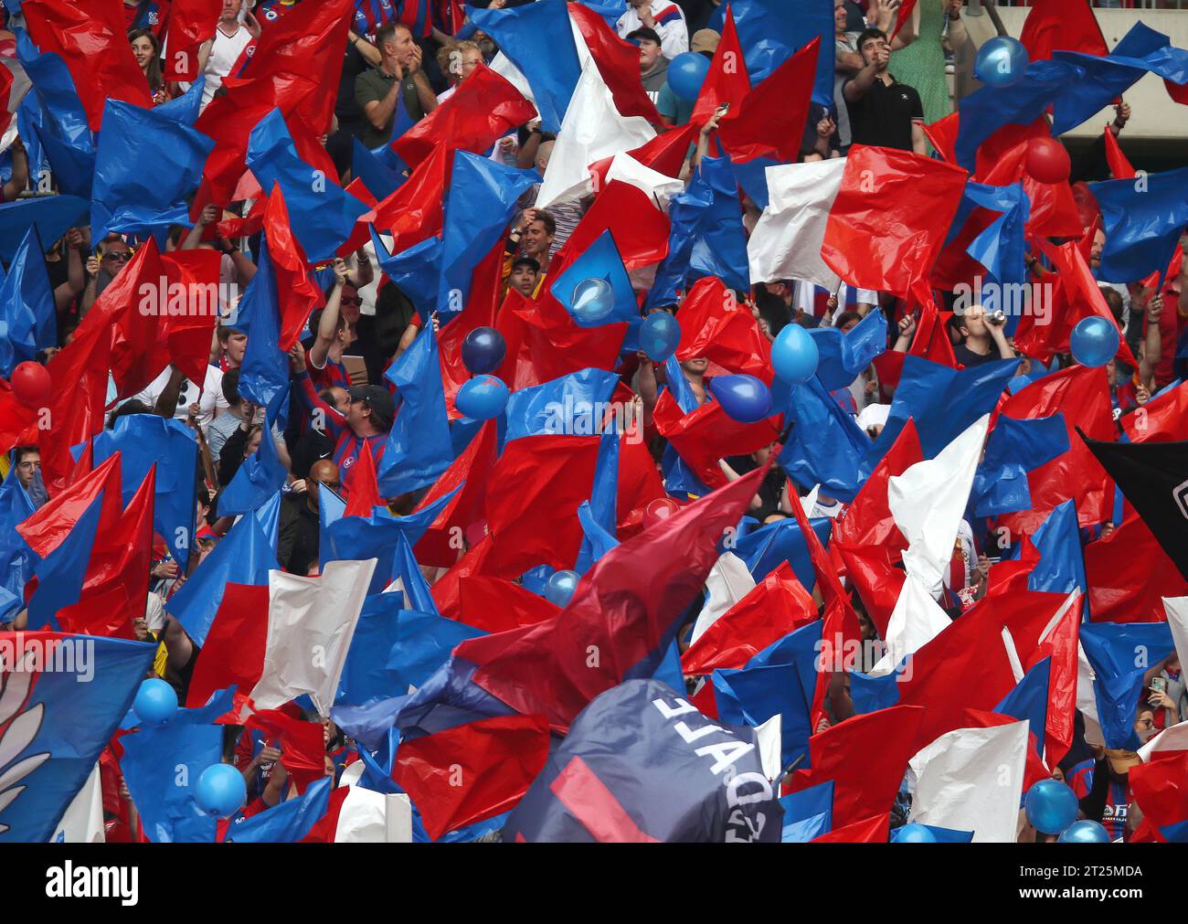 Crystal Palace fans waving flags & balloons as part of a display at ...