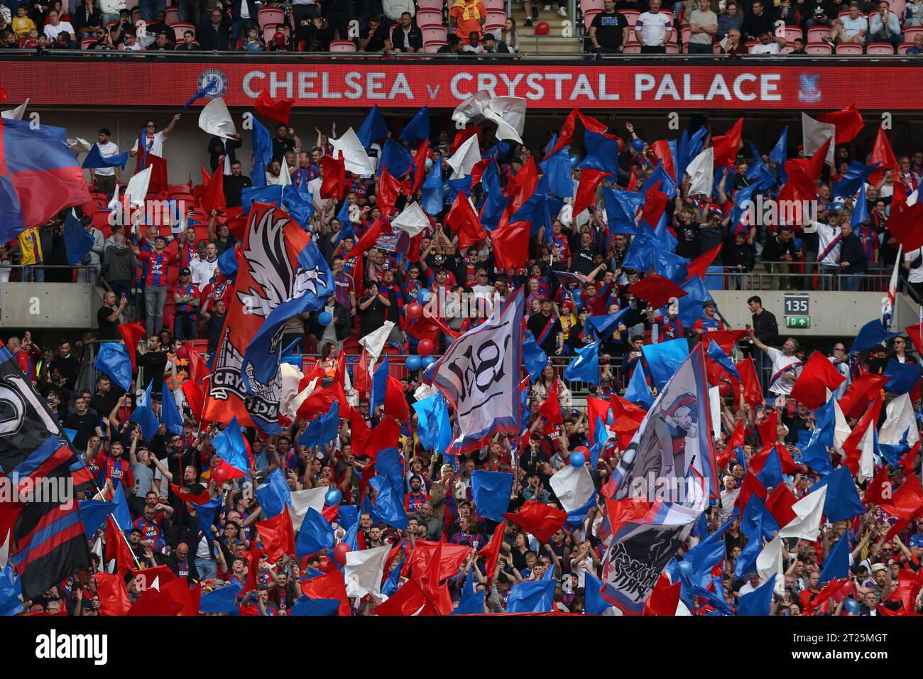 Crystal Palace fans waving flags & balloons as part of a display at ...