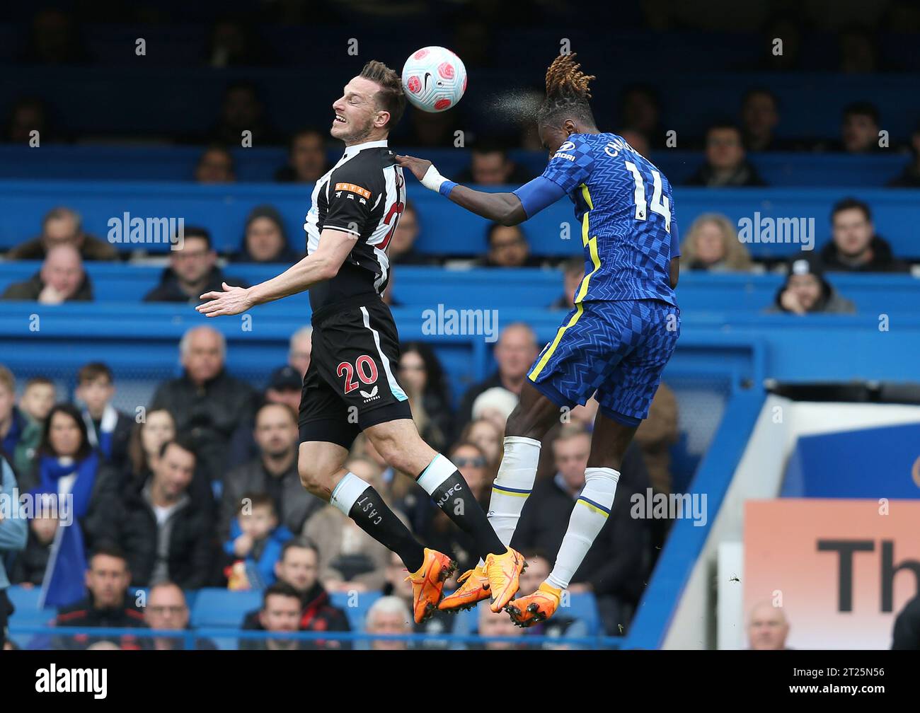 Chris Wood of Newcastle United challenges for the ariel ball with ...