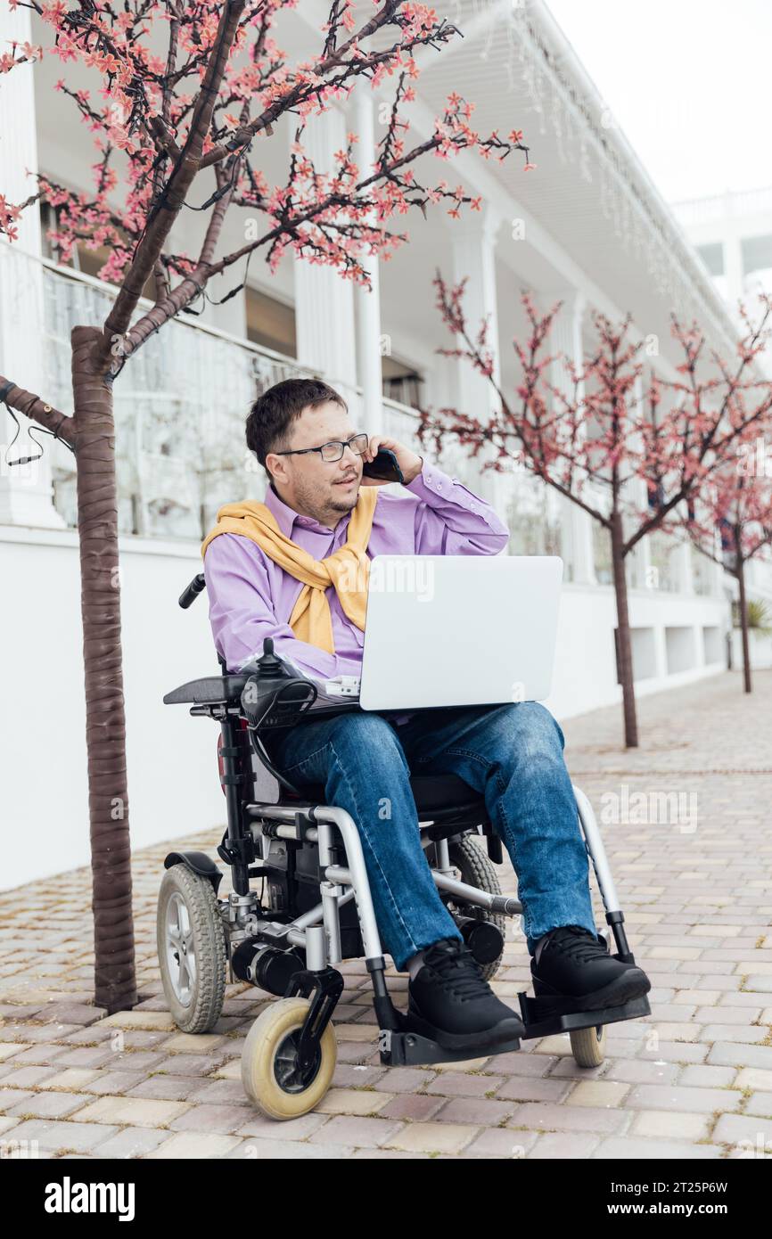 talking on the phone to a special person with disabilities with a ...