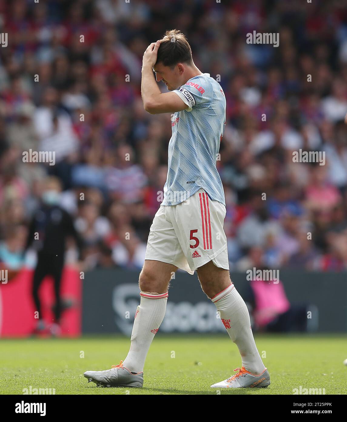 Harry Maguire of Manchester United looks disappointed & dejected ...