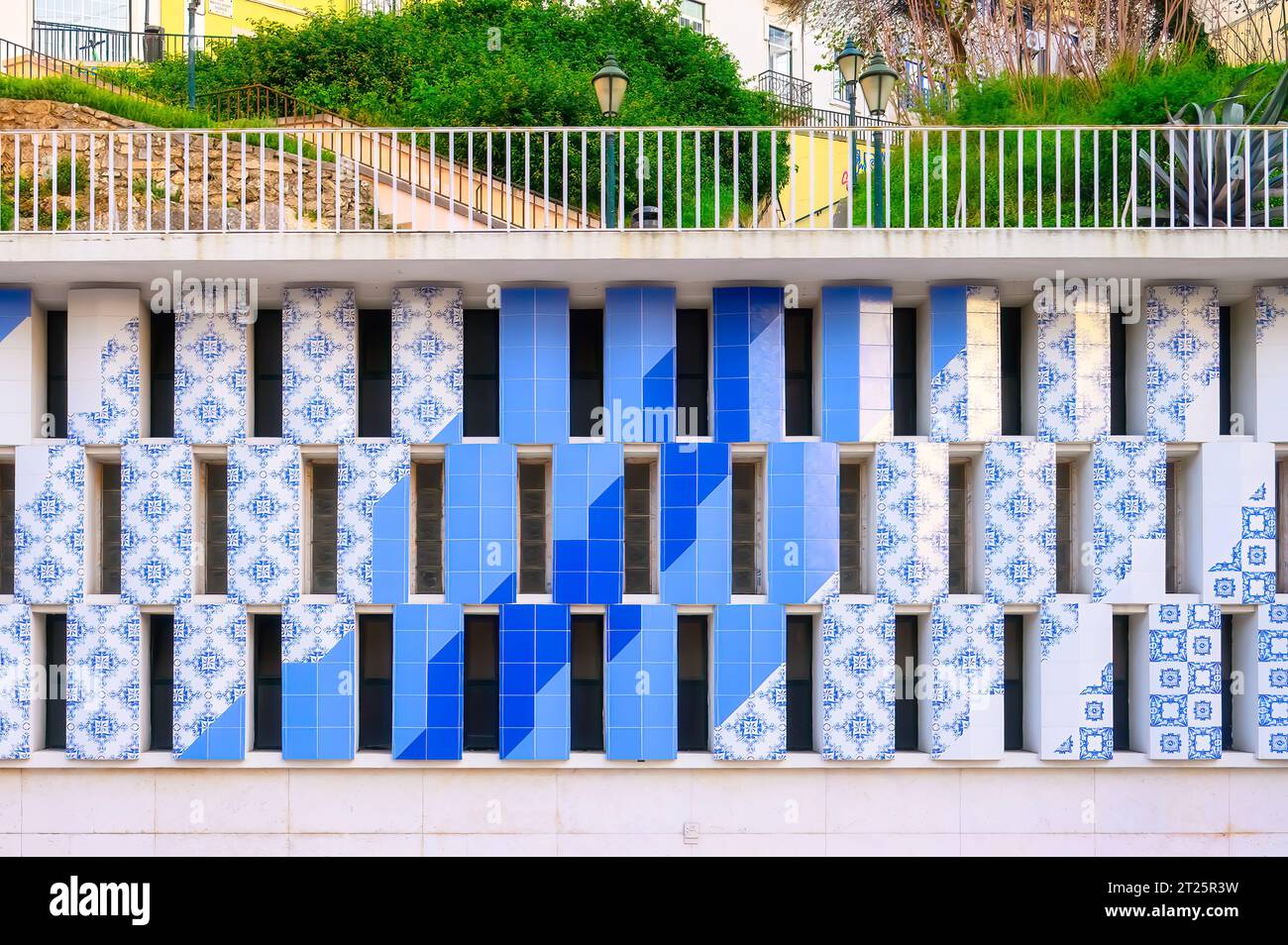 Lisbon, Portugal, front view of a wall covered in white and blue tiles ...