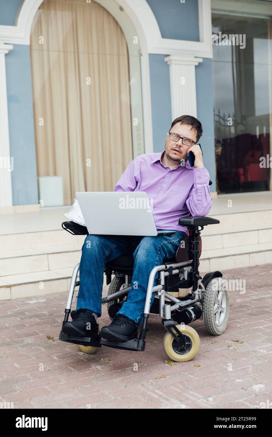 talking on the phone to a special person with disabilities with a ...