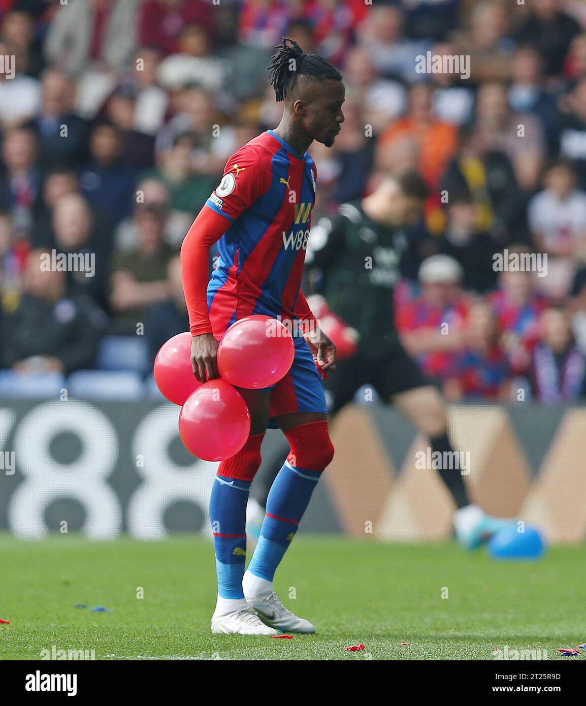 Crystal Palace fans release balloons as the players walk out on to the ...