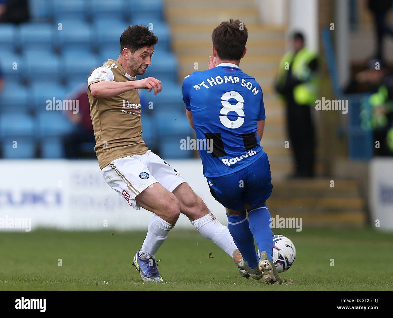 Joe Jacobson of Wycombe Wanderers on the ball taking on Ben Thompson of ...