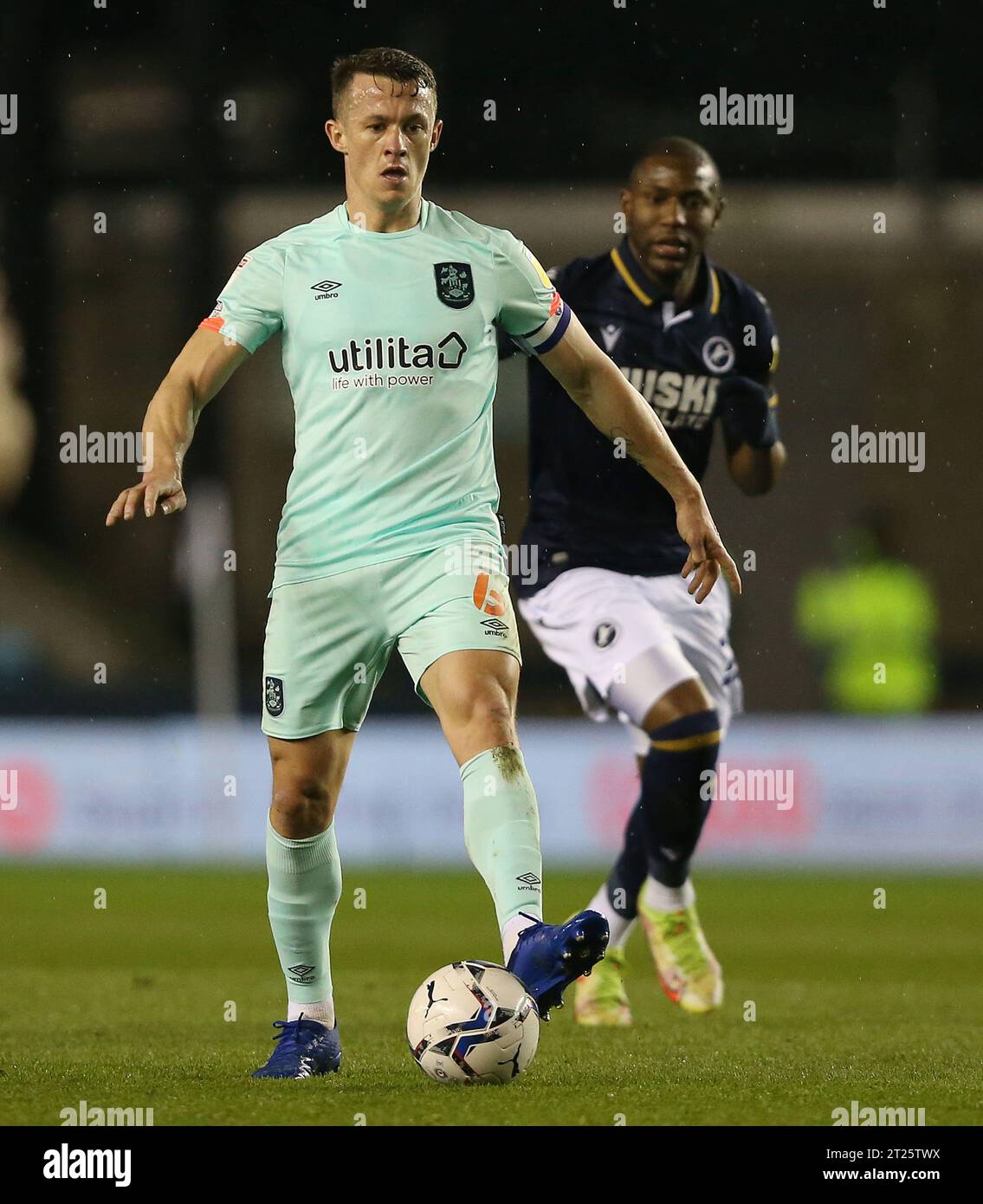 Matty Pearson of Huddersfield Town on the ball against Millwall ...