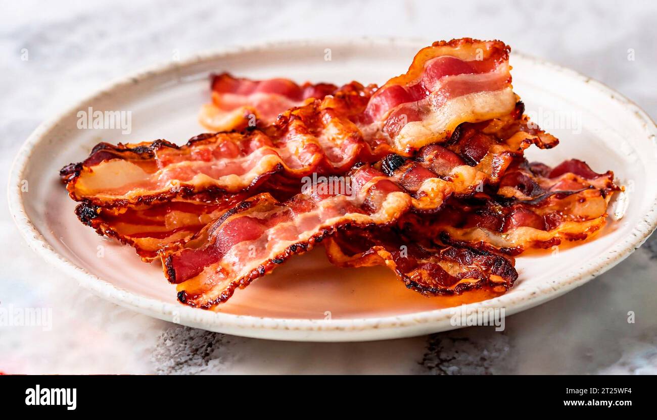 English breakfast. Egg and fried bacon. Serving breakfast on a marble ...