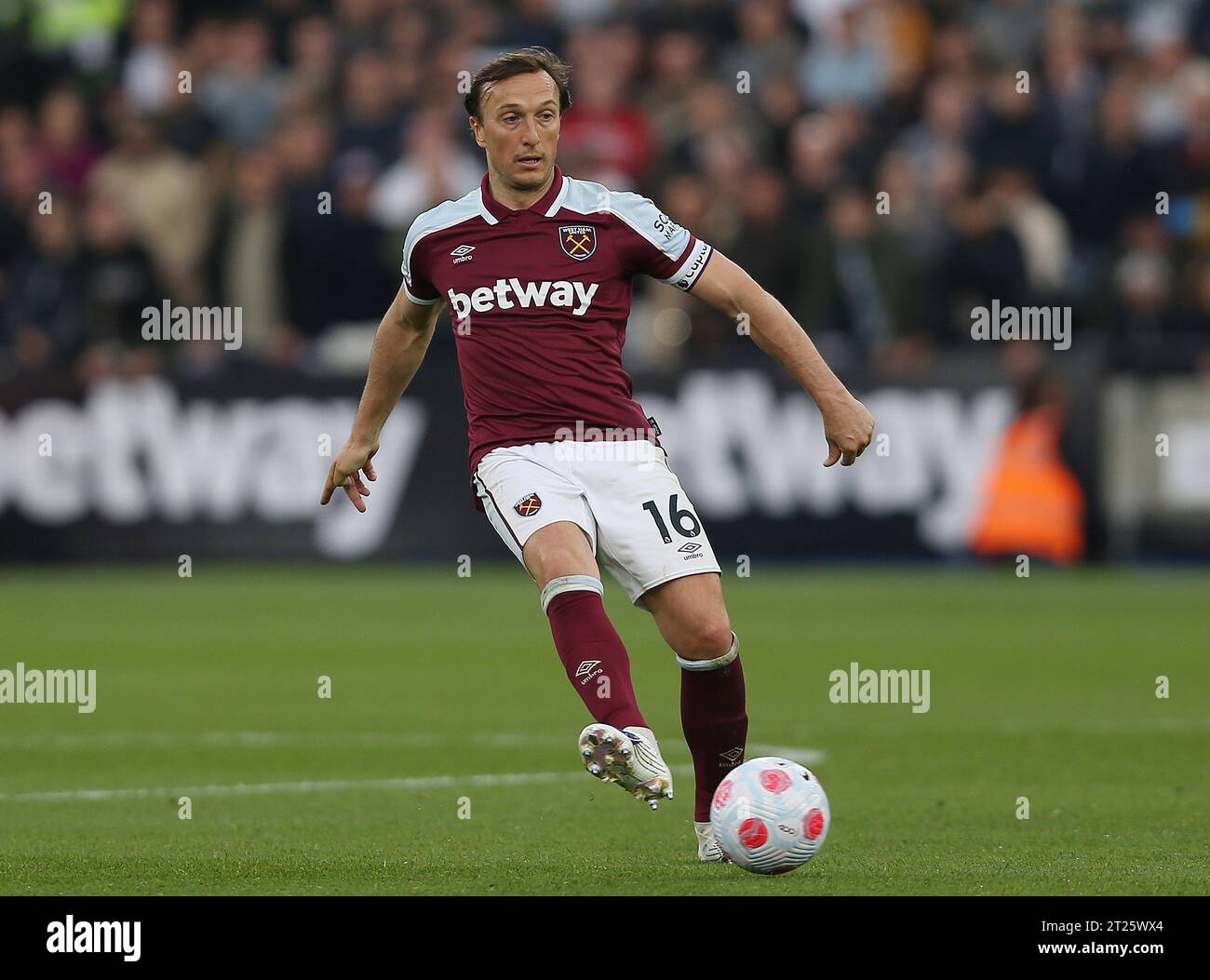 Mark Noble of West Ham United on the ball against Arsenal. - West Ham ...