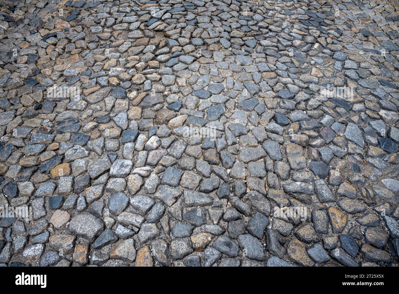 Stone paving background cobblestone pattern in Old Town, Evora ...