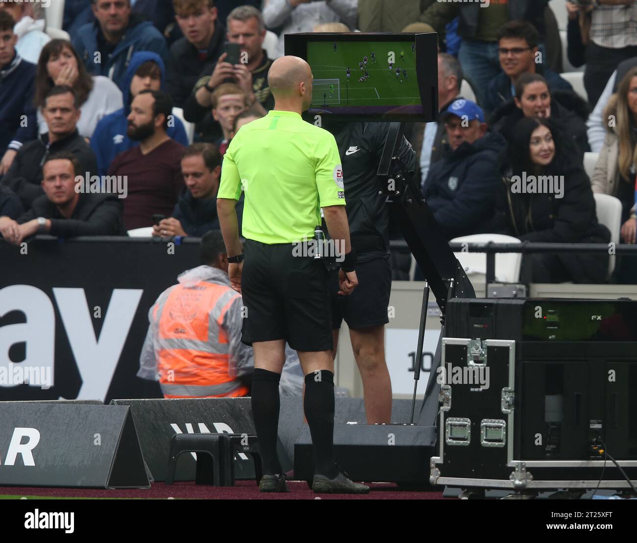 Referee, Anthony Taylor watches the Video Assistant Referee VAR monitor ...