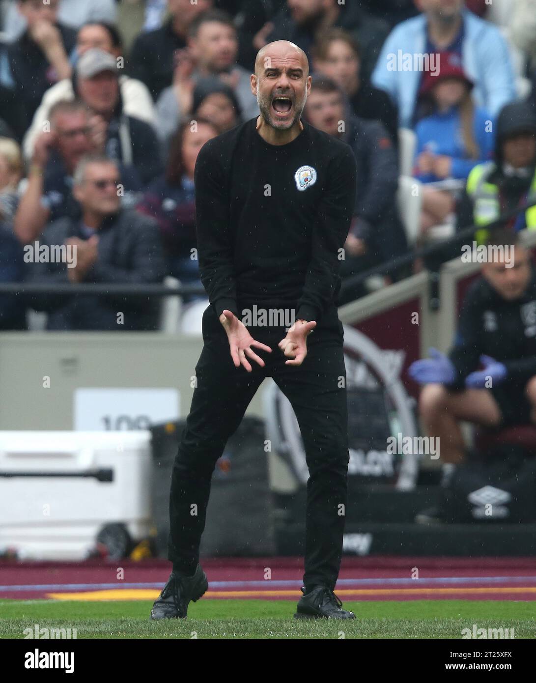 Josep Guardiola Manager of Manchester City looks disappointed ...
