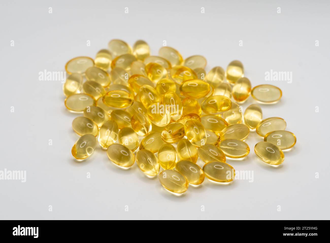 cod liver oil capsules isolated on white Stock Photo - Alamy