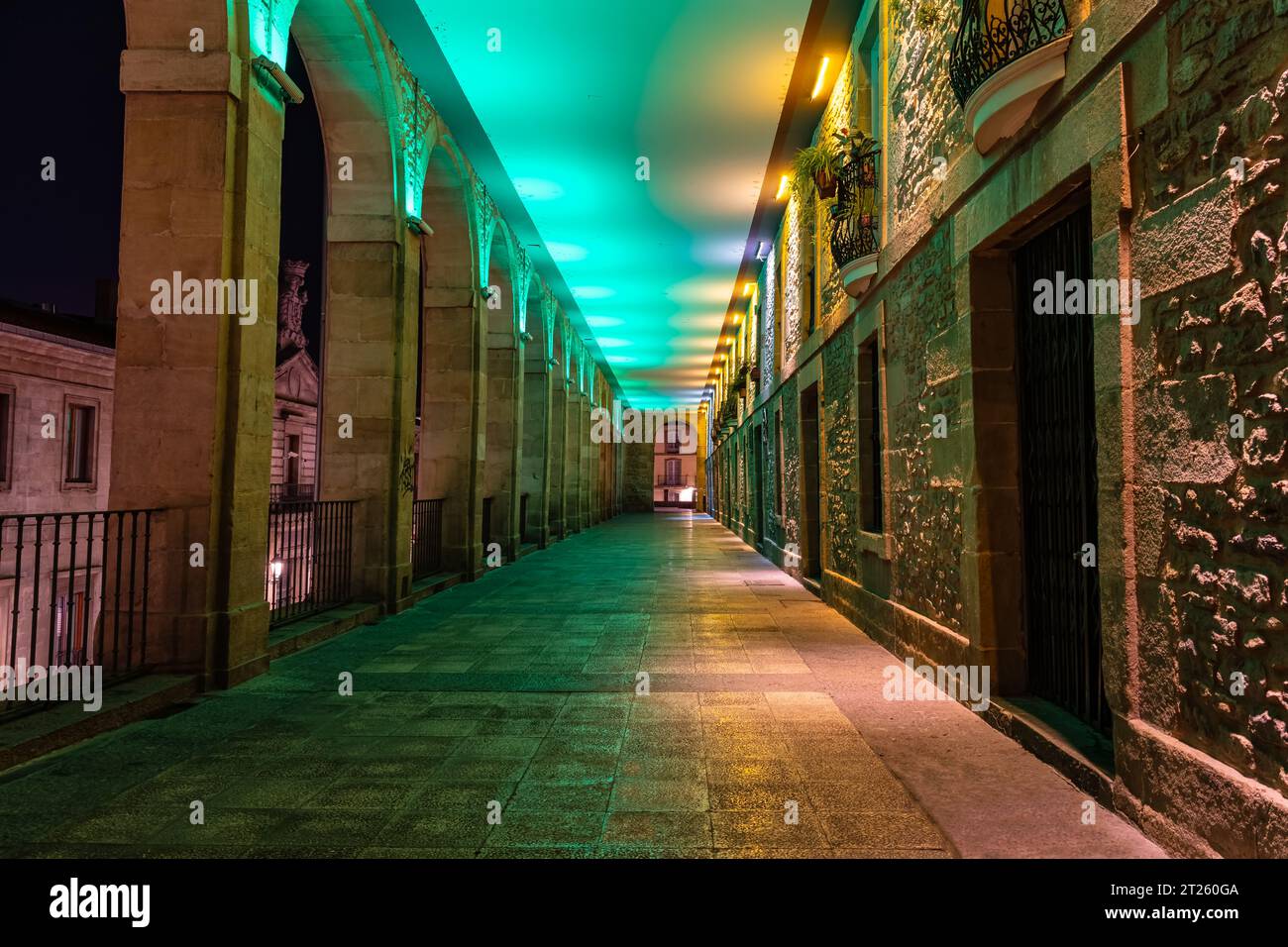 Arcades of old buildings in the medieval city of Vitoria, Basque ...