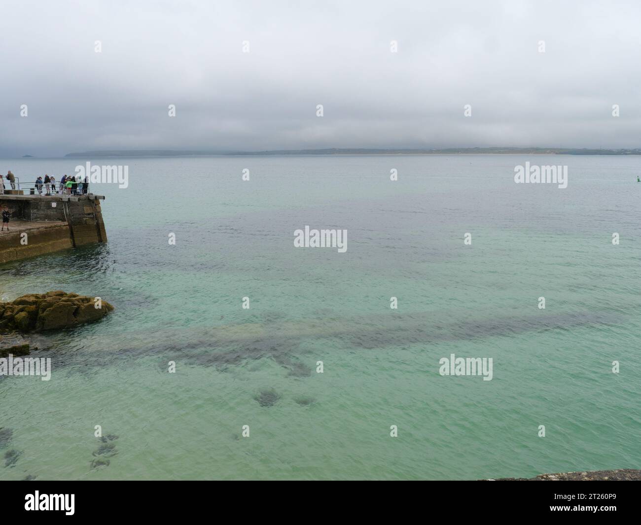 View of parts of the pier in the harbour of St Ives in Cornwall England ...
