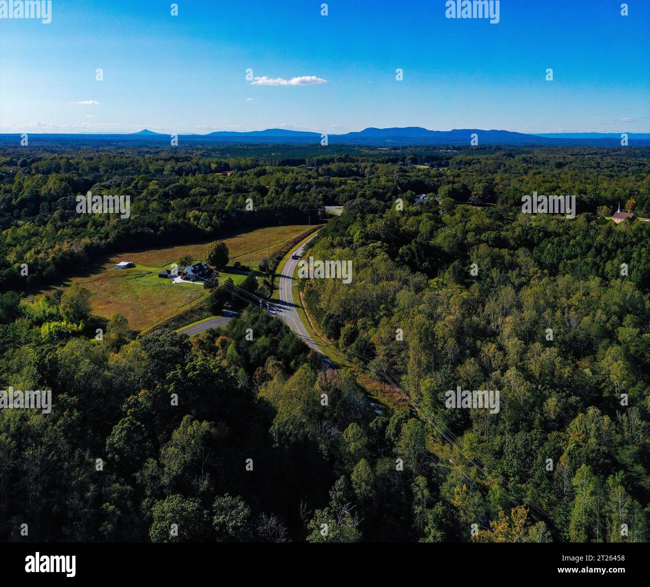 An aerial view of Pilot Mountain, Saurtown Mountains, and Hanging Rock ...