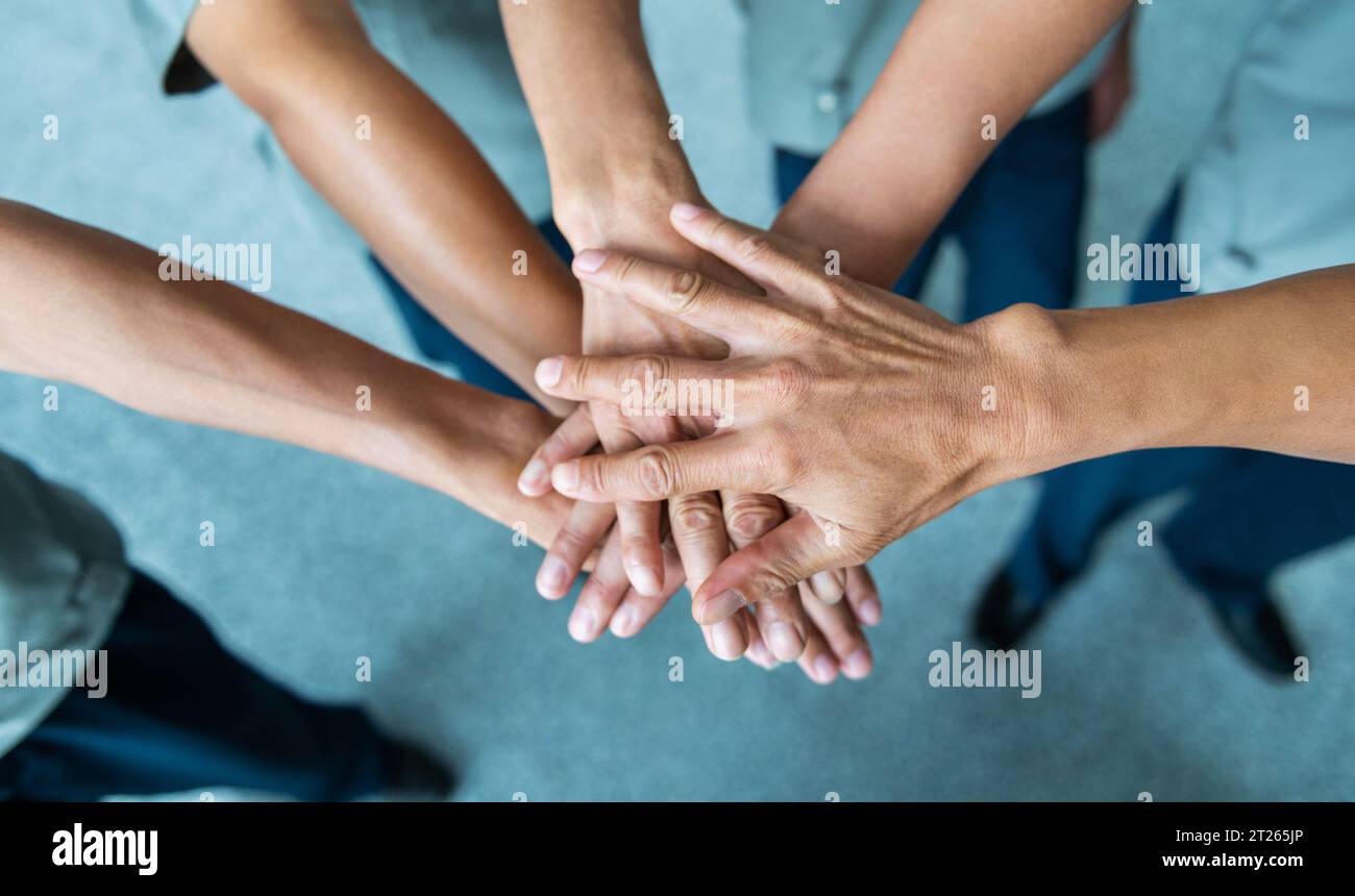 People putting hands together, team work concept Stock Photo - Alamy