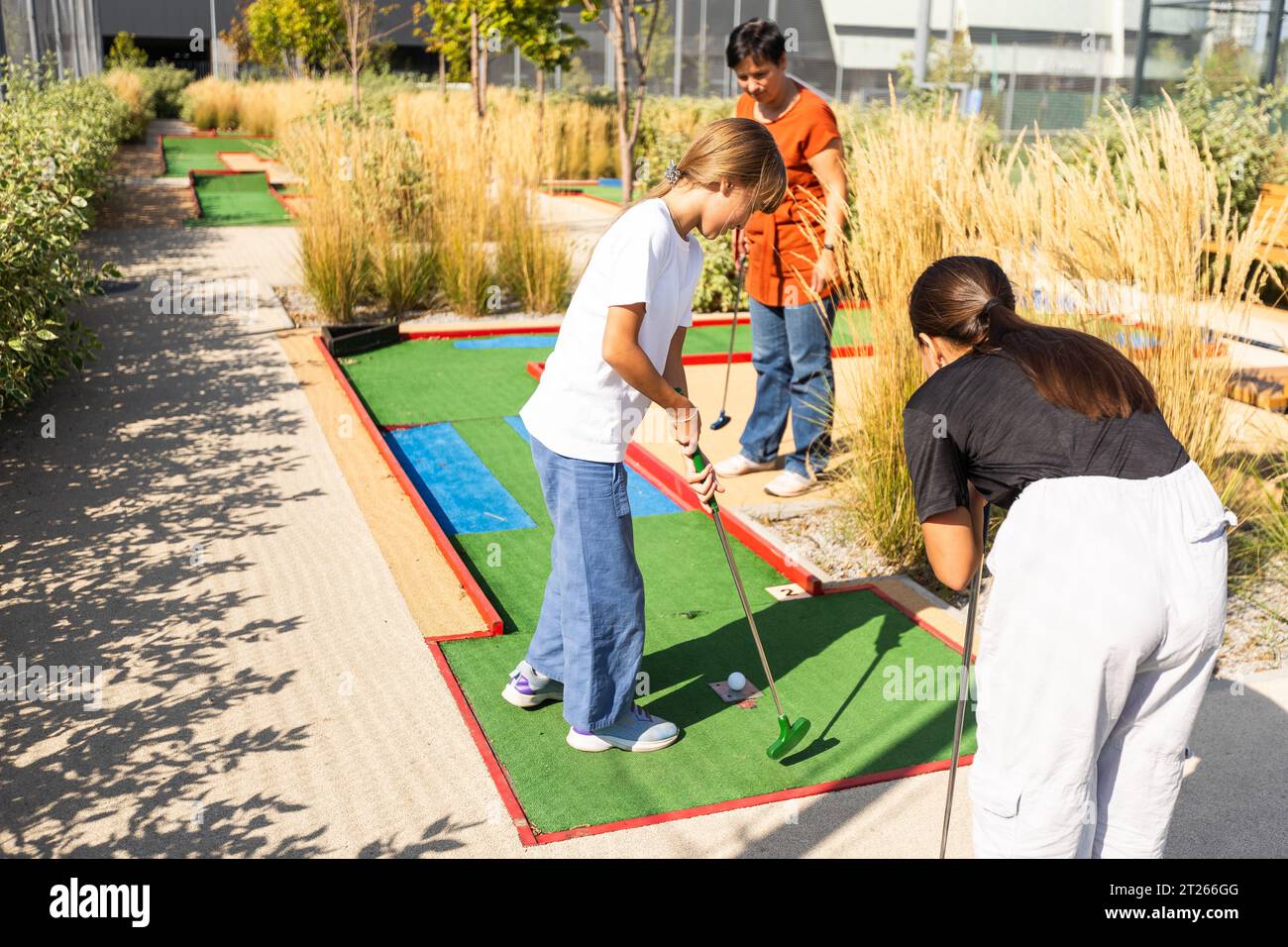 Golf course group of friends people with children posing standing Stock ...