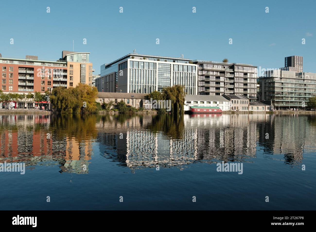 Modern part of Dublin Docklands, known as Silicon Docks, in warm autumn ...