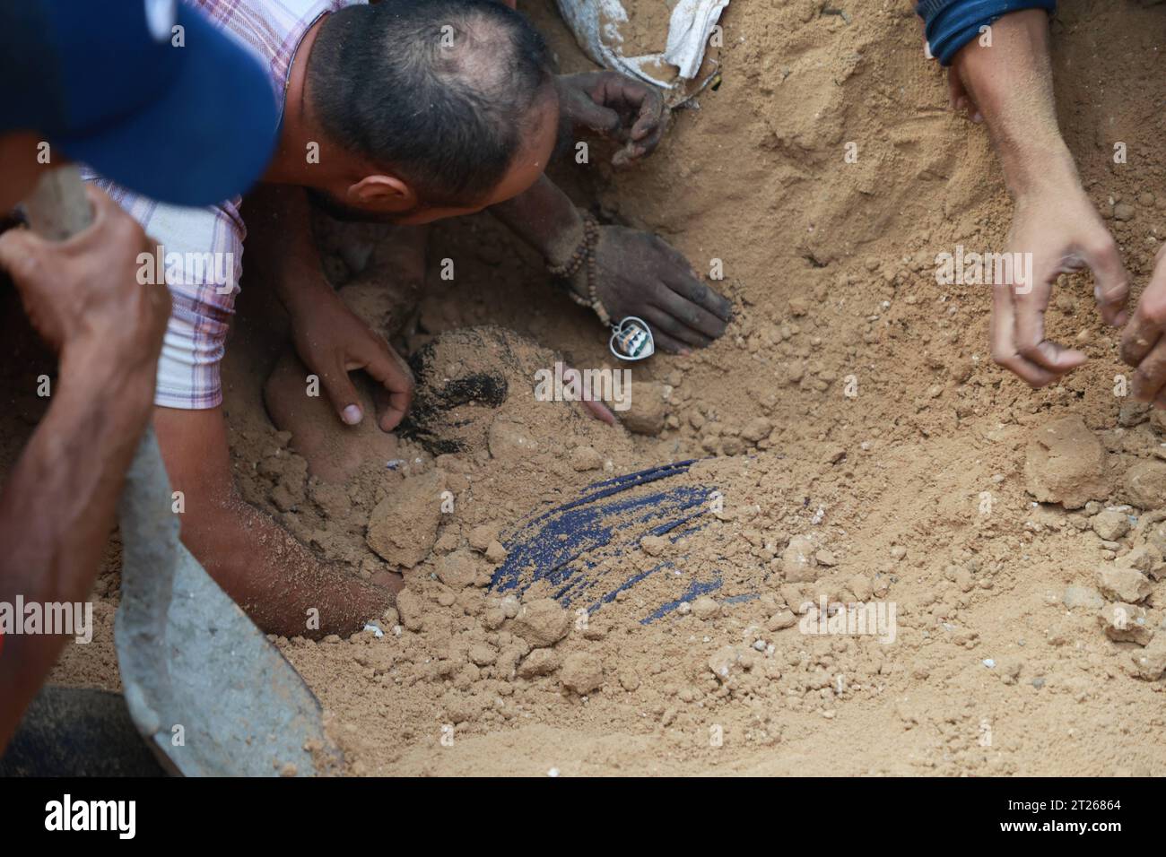 Palestinians evacuate victims following an Israeli airstrike on ...