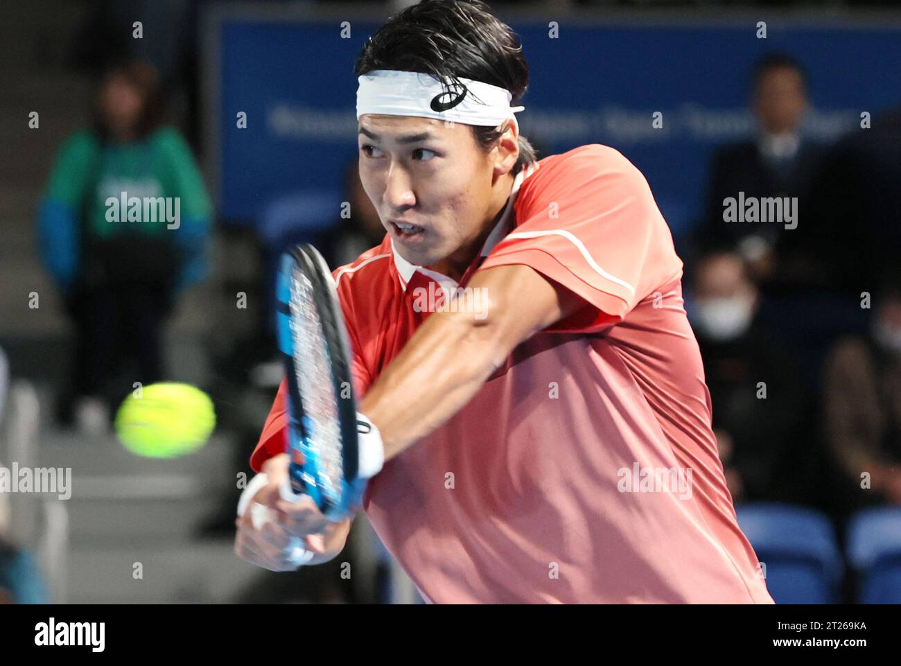 Tokyo, Japan. 17th Oct, 2023. Yosuke Watanuki of Japan returns the ball against Casper Ruud of ...