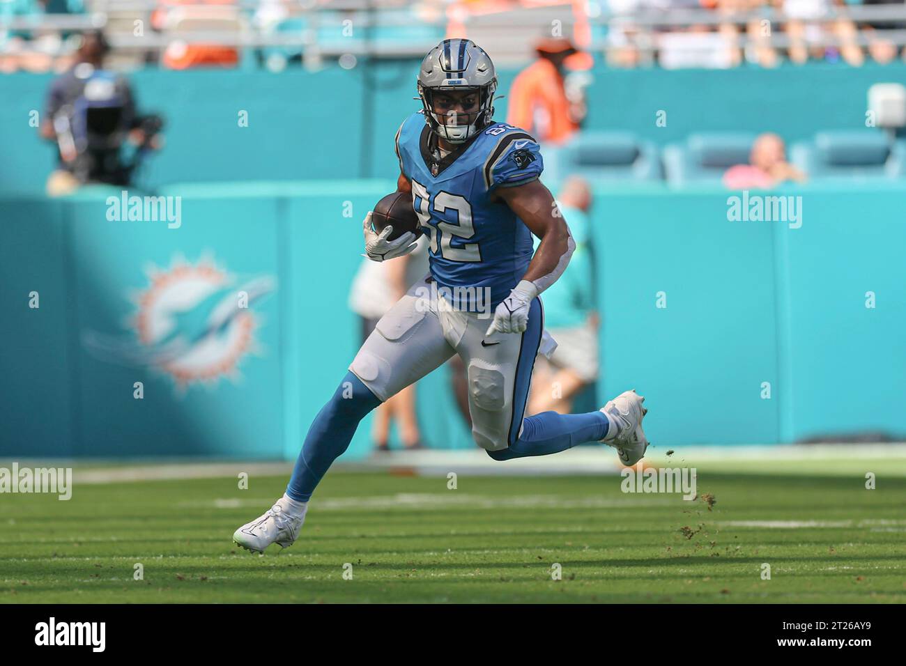 Miami. FL USA; Carolina Panthers tight end Tommy Tremble (82) runs with ...