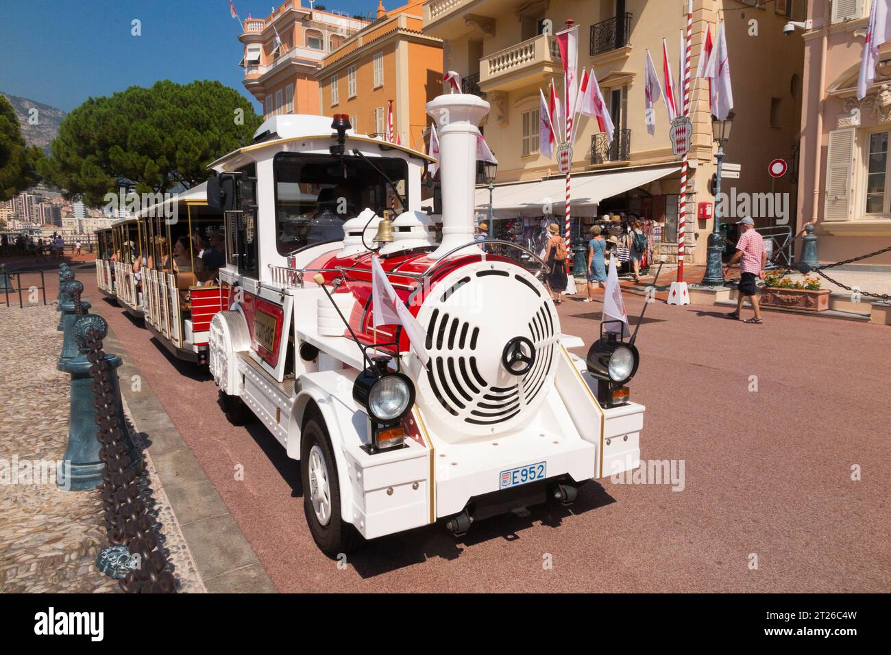 Tourist sightseeing train / trains with visitors enjoying tour of Place ...