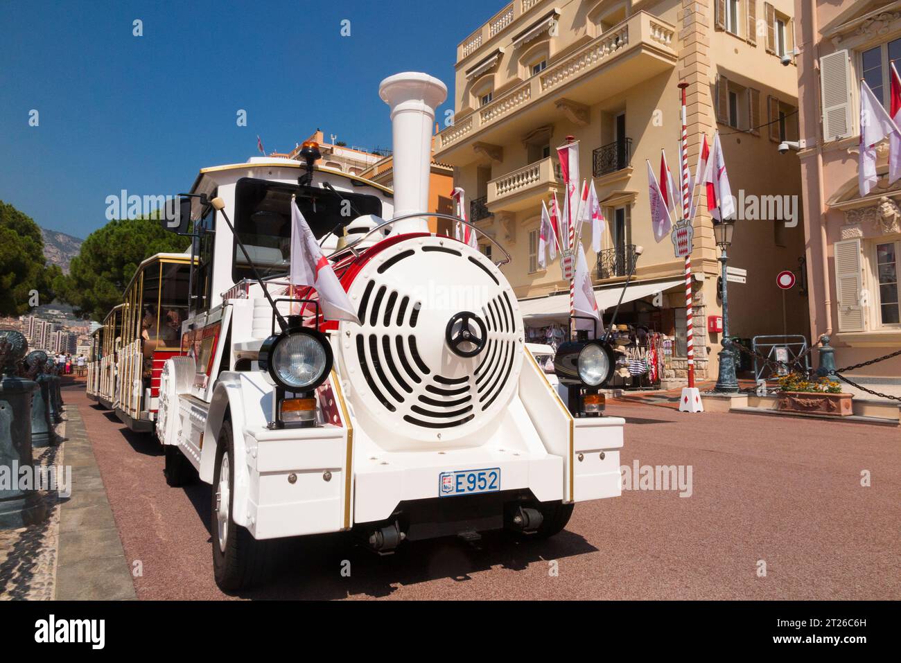 Tourist sightseeing train / trains with visitors enjoying tour of Place ...