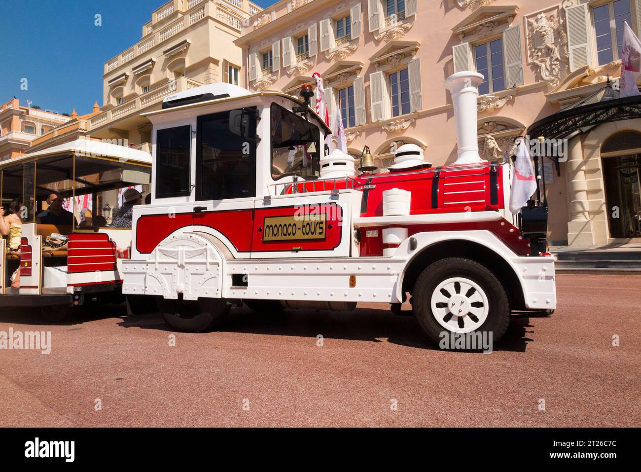 Tourist sightseeing train / trains with visitors enjoying tour of Place ...