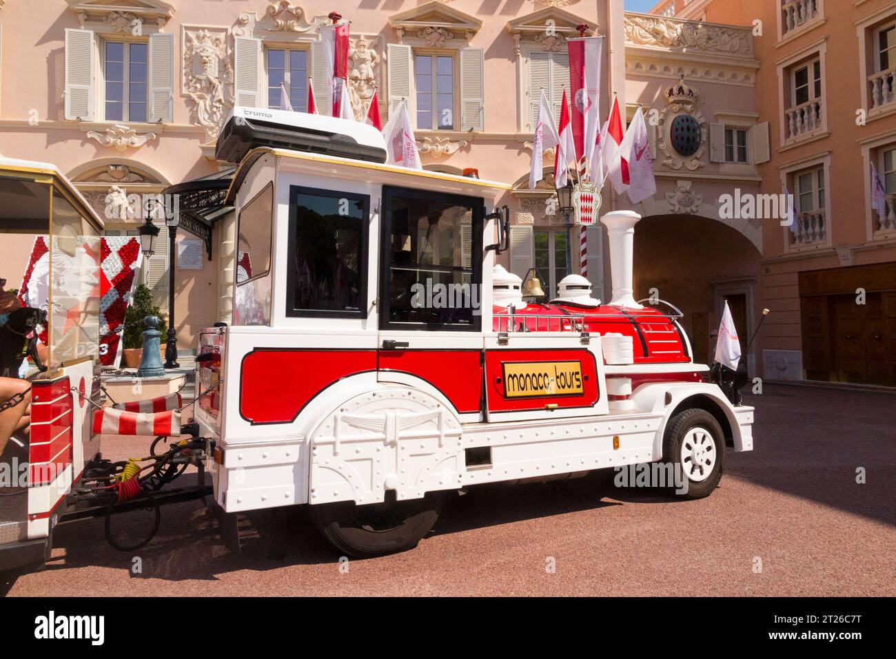 Tourist sightseeing train / trains with visitors enjoying tour of Place ...