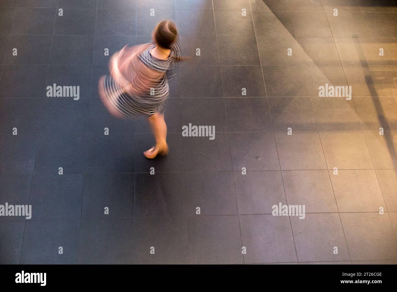 Young girl / child / kid, age 11 years, relaxes practising her dance ...