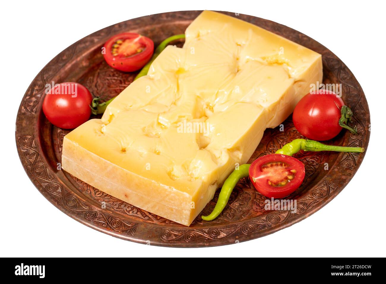 Gruyere cheese on a copper plate. Slices of gruyere cheese isolated on ...