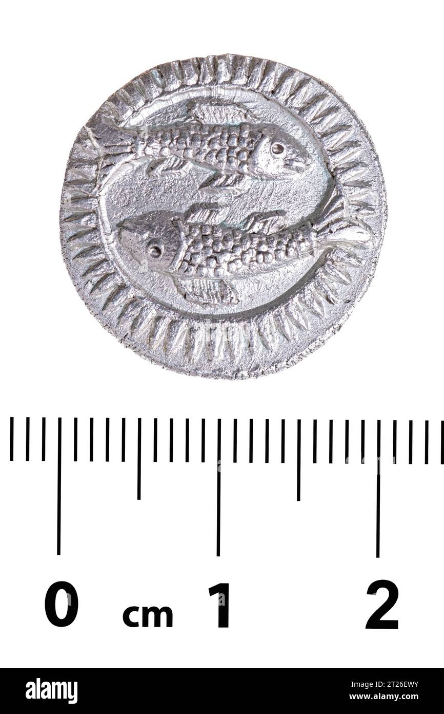 Ancient silver Indian rupee with fish and inscription in Arabic ...