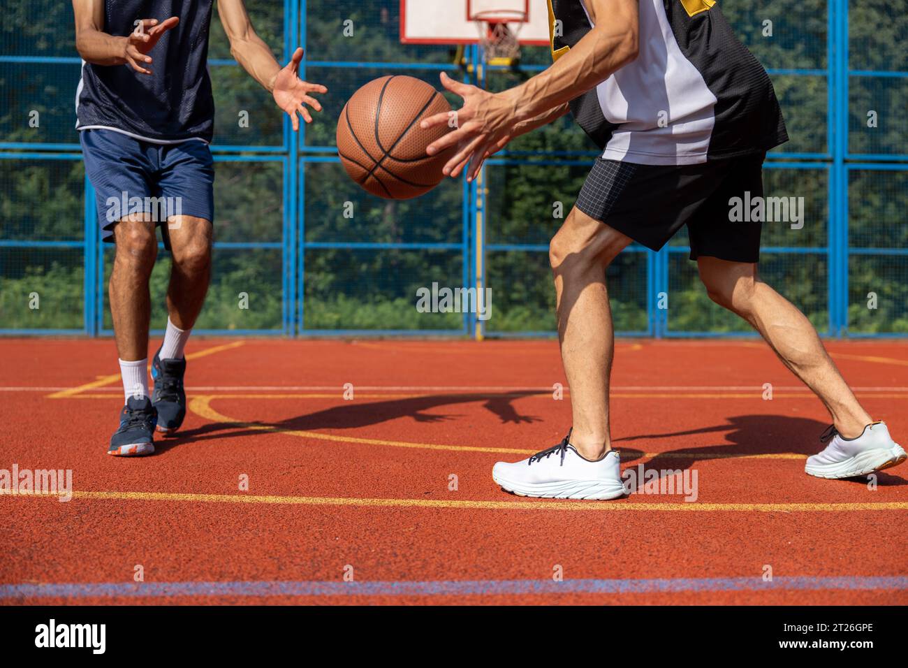 Low section basketball player playing hi-res stock photography and ...