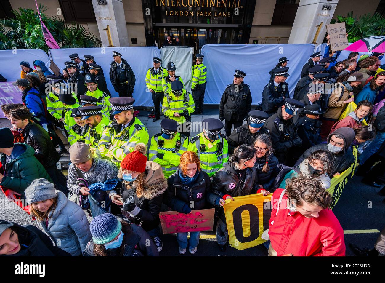 London, UK. 17th Oct, 2023. Protesters block the main entrance to the ...