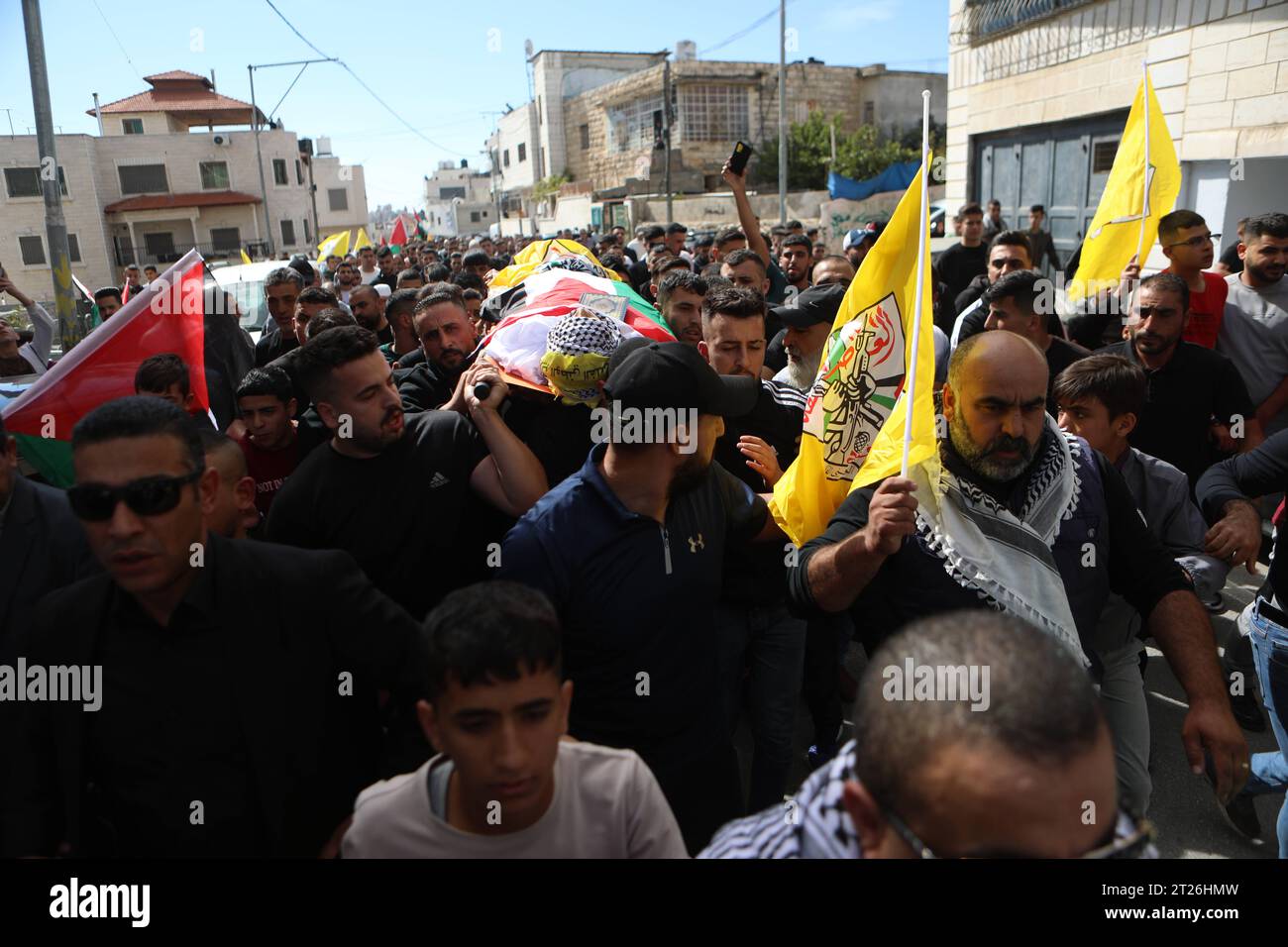 People carry the death body of 17-year-old Palestinian Muhammed Nidal ...