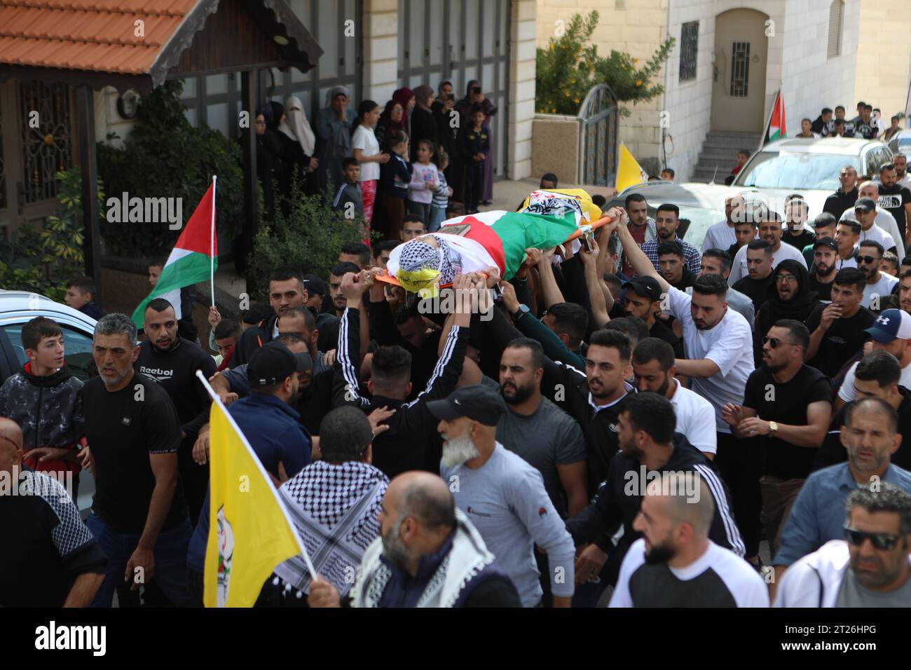 People carry the death body of 17-year-old Palestinian Muhammed Nidal ...