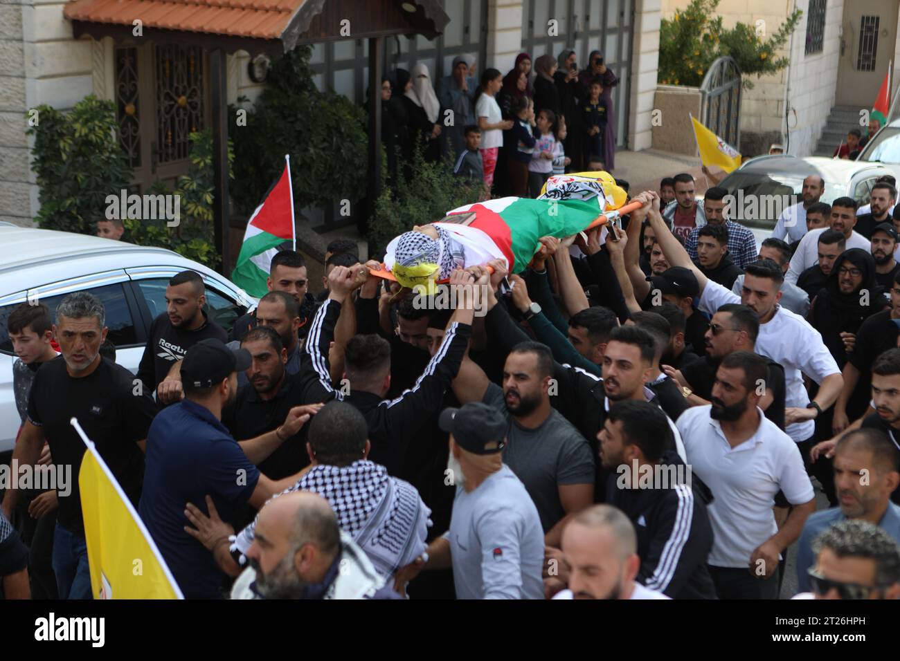People carry the death body of 17-year-old Palestinian Muhammed Nidal ...