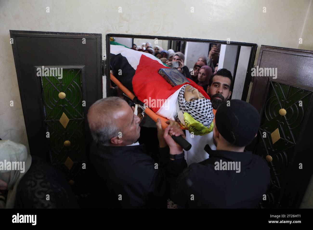 People carry the death body of 17-year-old Palestinian Muhammed Nidal ...
