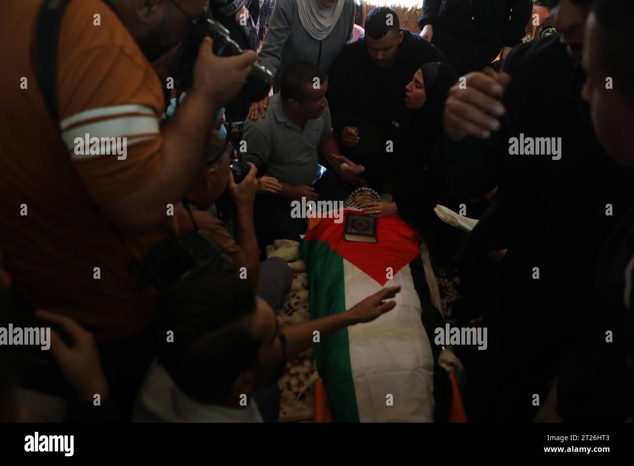 People carry the death body of 17-year-old Palestinian Muhammed Nidal ...