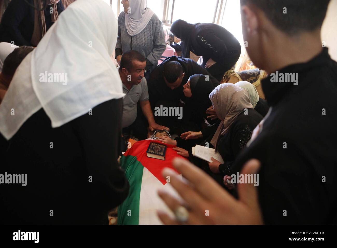 People carry the death body of 17-year-old Palestinian Muhammed Nidal ...