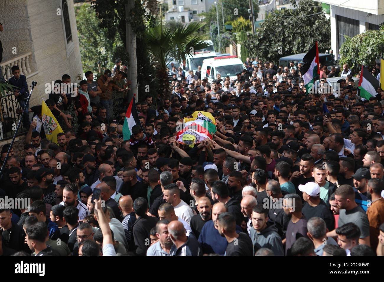 People carry the death body of 17-year-old Palestinian Muhammed Nidal ...