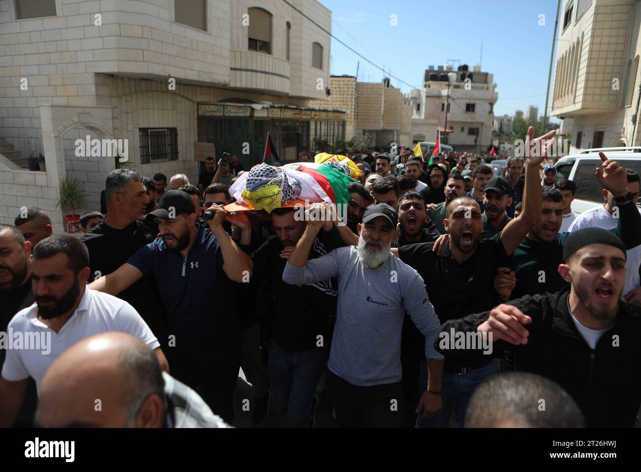 People carry the death body of 17-year-old Palestinian Muhammed Nidal ...