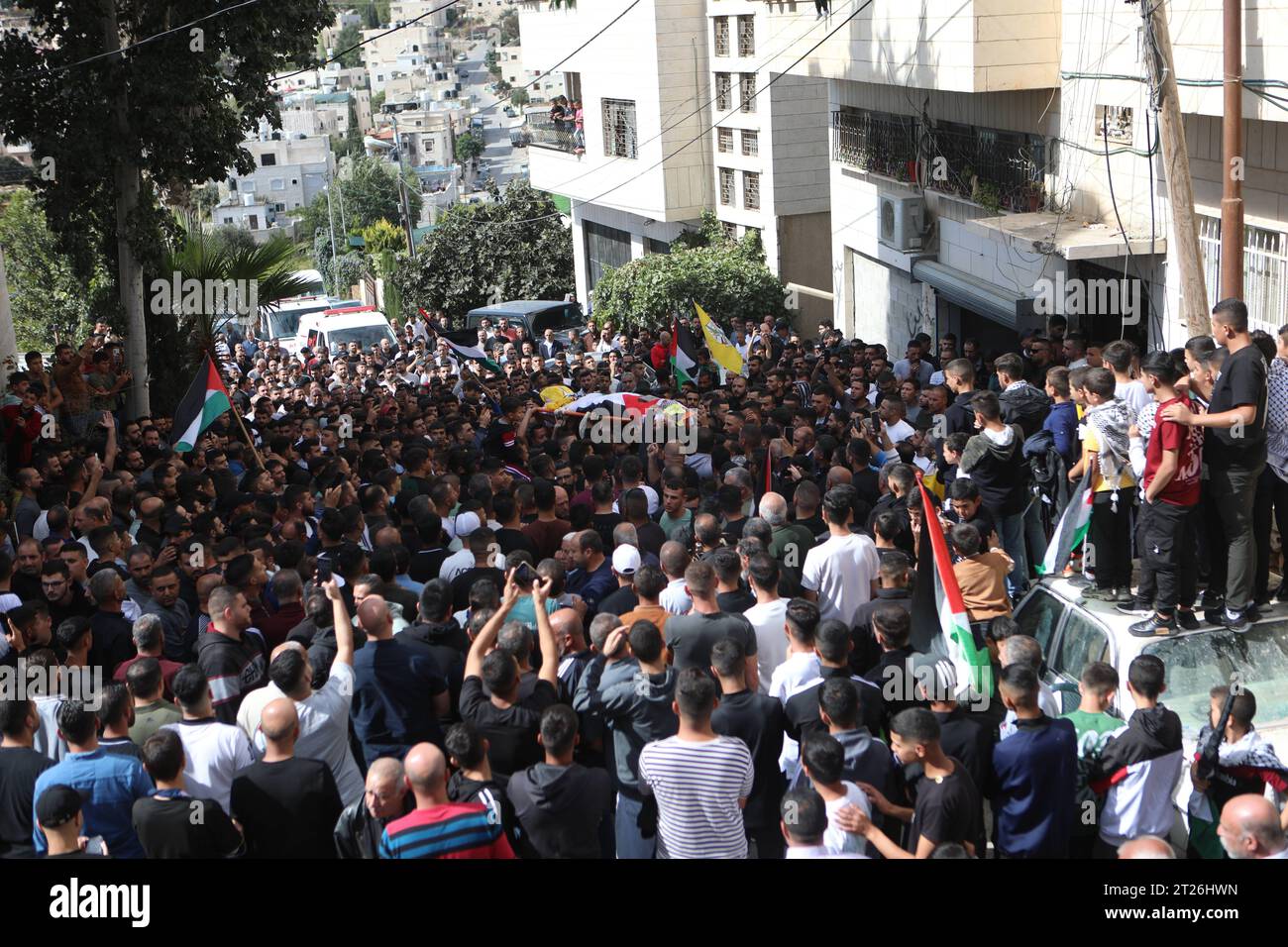 People carry the death body of 17-year-old Palestinian Muhammed Nidal ...