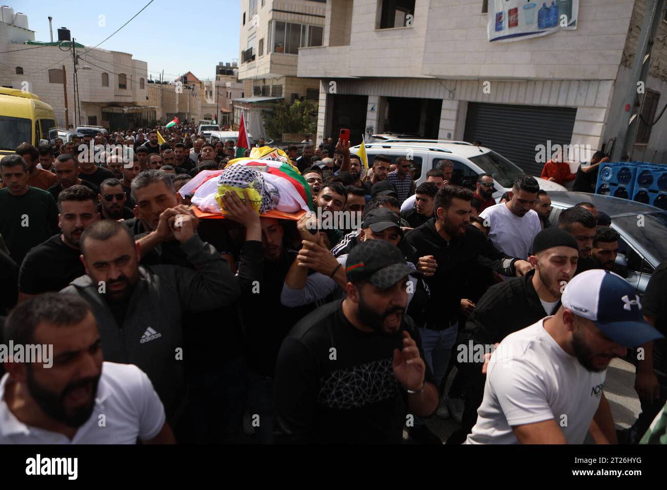 People carry the death body of 17-year-old Palestinian Muhammed Nidal ...