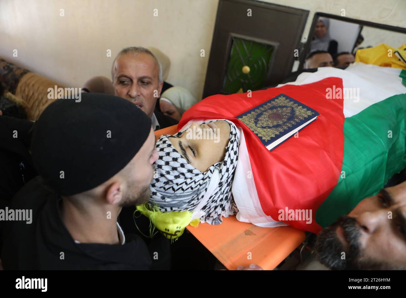 People carry the death body of 17-year-old Palestinian Muhammed Nidal ...