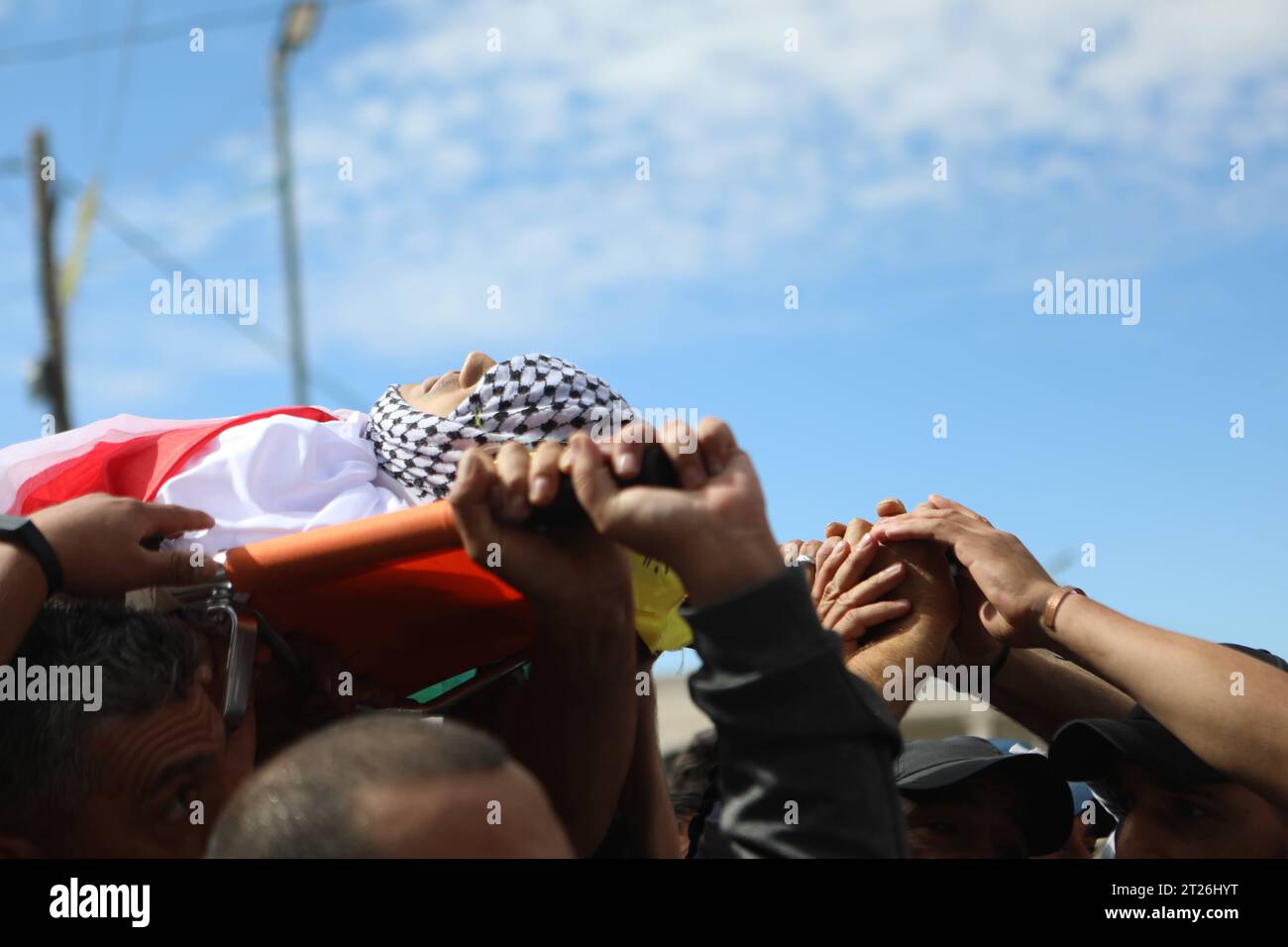 People carry the death body of 17-year-old Palestinian Muhammed Nidal ...