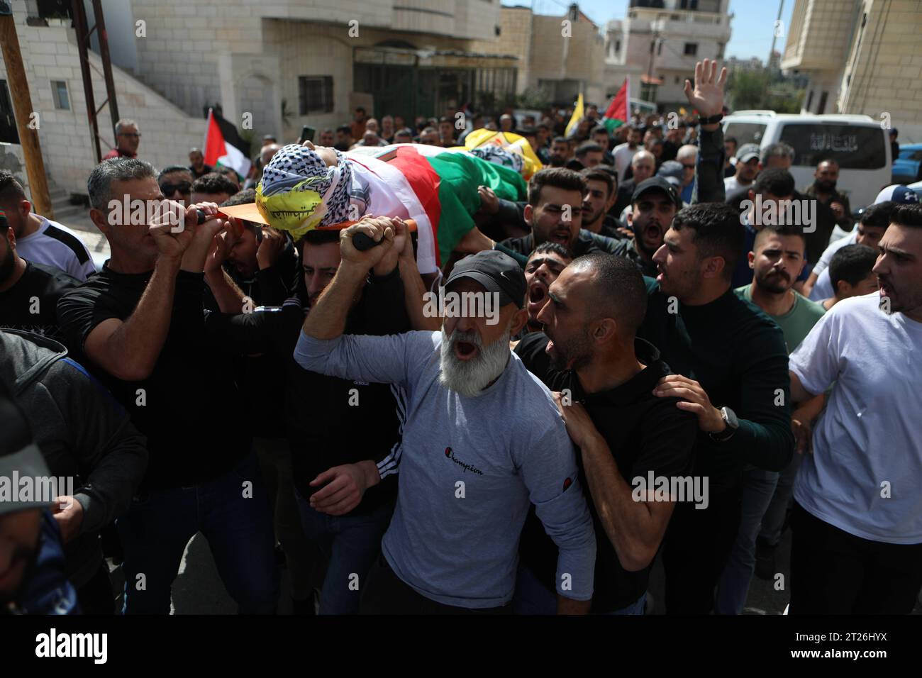 People carry the death body of 17-year-old Palestinian Muhammed Nidal ...