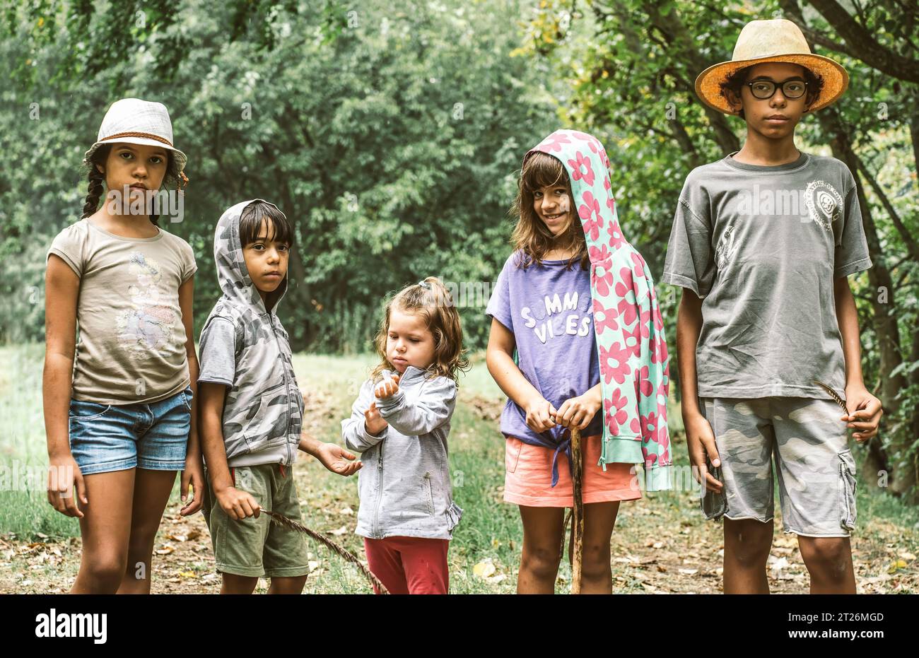 Little nature-loving explorers having fun together for a group photo ...