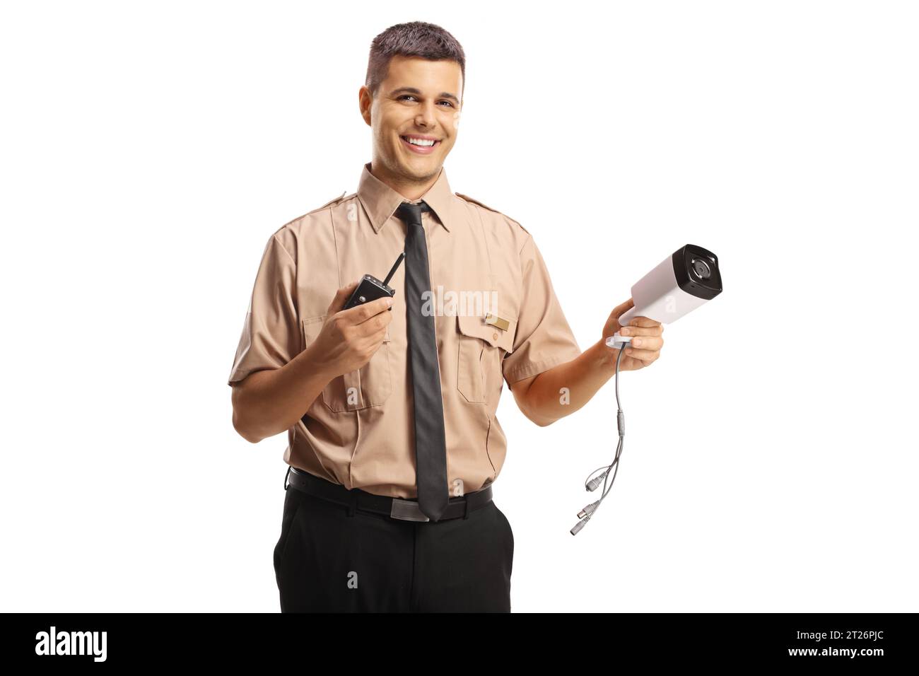 Young security guard holding a walkie talkie and a surveillance camera ...